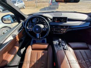 Black BMW X5 2014 in Tartu, with an engine capacity of 3.00 L and mileage of 228 thousand km for 23490 €, photo 16 on AUTOMOTO.COM.LV
