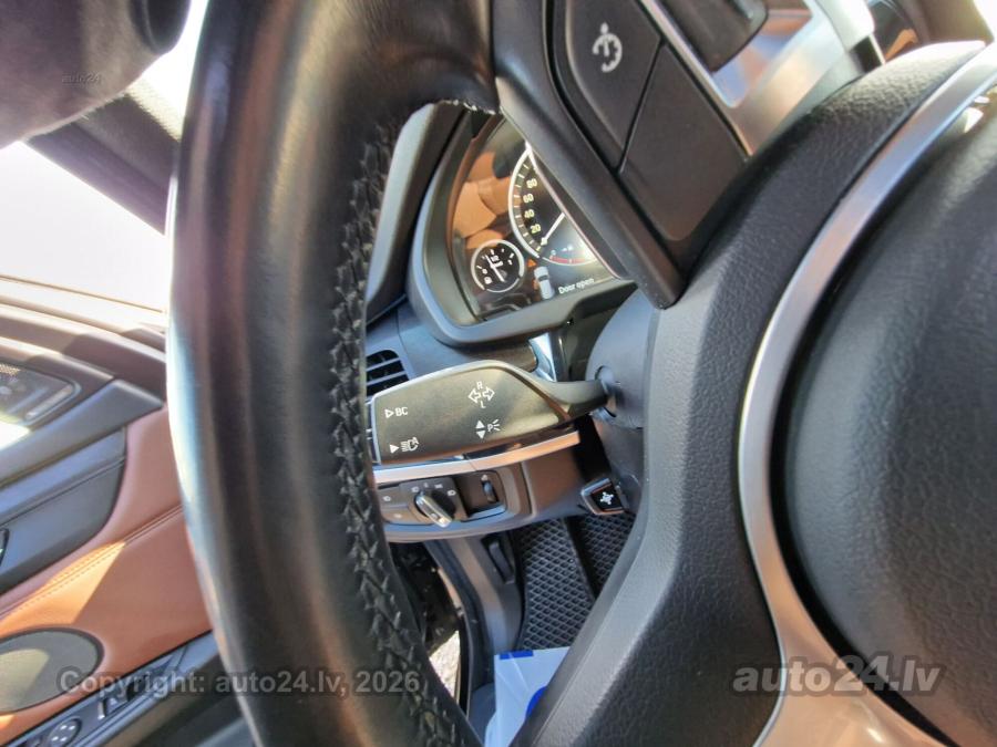 Black BMW X5 2014 in Tartu, with an engine capacity of 3.00 L and mileage of 228 thousand km for 23490 €, photo 17 on AUTOMOTO.COM.LV