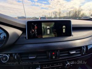 Black BMW X5 2014 in Tartu, with an engine capacity of 3.00 L and mileage of 228 thousand km for 23490 €, photo 19 on AUTOMOTO.COM.LV