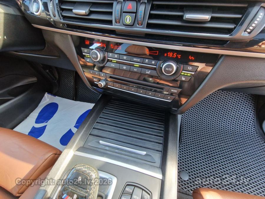 Black BMW X5 2014 in Tartu, with an engine capacity of 3.00 L and mileage of 228 thousand km for 23490 €, photo 21 on AUTOMOTO.COM.LV