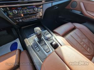 Black BMW X5 2014 in Tartu, with an engine capacity of 3.00 L and mileage of 228 thousand km for 23490 €, photo 22 on AUTOMOTO.COM.LV