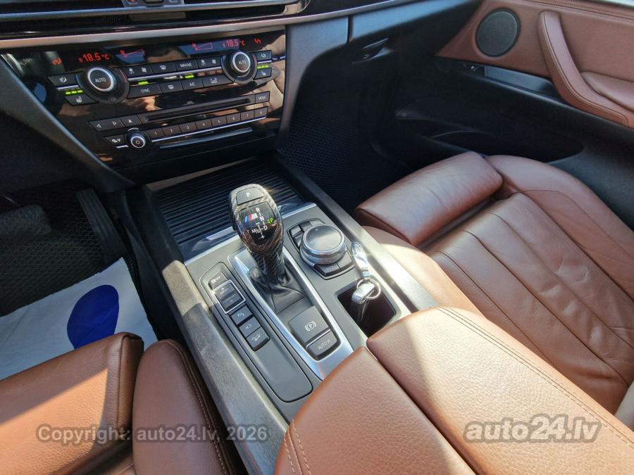Black BMW X5 2014 in Tartu, with an engine capacity of 3.00 L and mileage of 228 thousand km for 23490 €, photo 22 on AUTOMOTO.COM.LV
