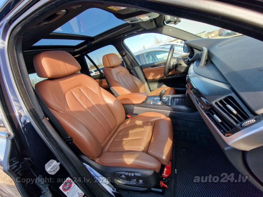 Black BMW X5 2014 in Tartu, with an engine capacity of 3.00 L and mileage of 228 thousand km for 23490 €, photo 24 on AUTOMOTO.COM.LV