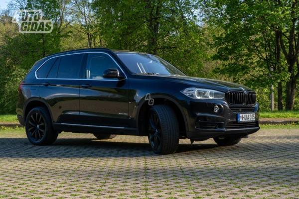 Black BMW X5 2014 in Vilnius, with an engine capacity of 3.50 L and mileage of 201 thousand km for 18999 €, photo 3 on AUTOMOTO.COM.LV