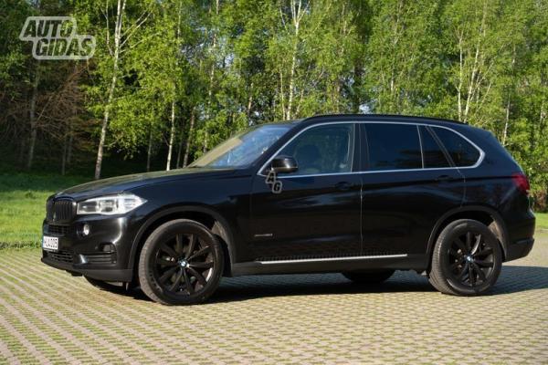 Black BMW X5 2014 in Vilnius, with an engine capacity of 3.50 L and mileage of 201 thousand km for 18999 €, photo 6 on AUTOMOTO.COM.LV