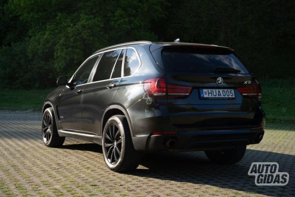 Black BMW X5 2014 in Vilnius, with an engine capacity of 3.50 L and mileage of 201 thousand km for 18999 €, photo 7 on AUTOMOTO.COM.LV