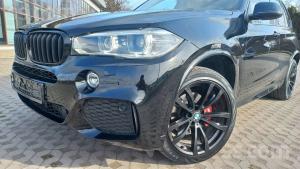 Black BMW X5 2014 in Riga, with an engine capacity of 3.00 L and mileage of 206 thousand km for 16950 €, photo  on AUTOMOTO.COM.LV