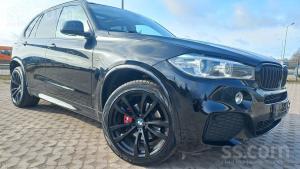 Black BMW X5 2014 in Riga, with an engine capacity of 3.00 L and mileage of 206 thousand km for 16950 €, photo 8 on AUTOMOTO.COM.LV