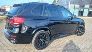 Black BMW X5 2014 in Riga, with an engine capacity of 3.00 L and mileage of 206 thousand km for 16950 €, photo 9 on AUTOMOTO.COM.LV