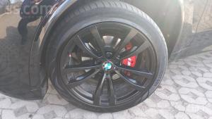 Black BMW X5 2014 in Riga, with an engine capacity of 3.00 L and mileage of 206 thousand km for 16950 €, photo 12 on AUTOMOTO.COM.LV
