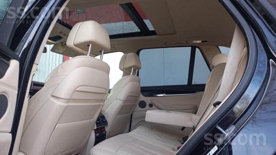 Black BMW X5 2014 in Riga, with an engine capacity of 3.00 L and mileage of 206 thousand km for 16950 €, photo 15 on AUTOMOTO.COM.LV
