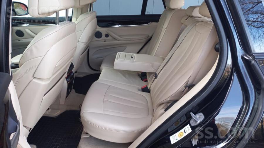 Black BMW X5 2014 in Riga, with an engine capacity of 3.00 L and mileage of 206 thousand km for 16950 €, photo 16 on AUTOMOTO.COM.LV