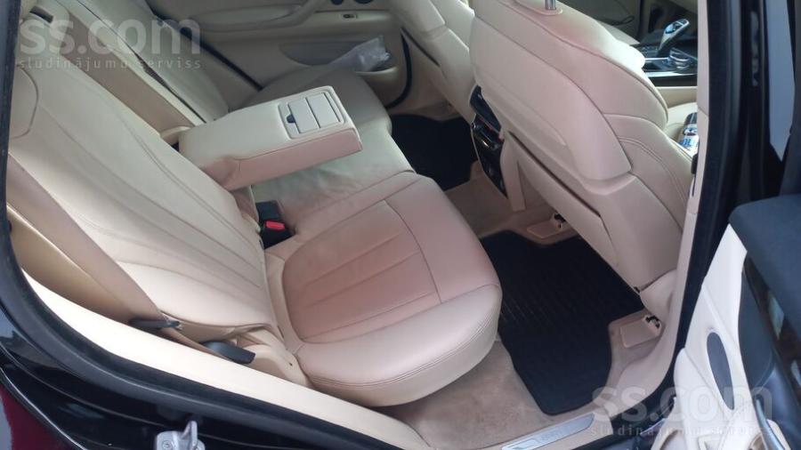 Black BMW X5 2014 in Riga, with an engine capacity of 3.00 L and mileage of 206 thousand km for 16950 €, photo 17 on AUTOMOTO.COM.LV