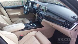 Black BMW X5 2014 in Riga, with an engine capacity of 3.00 L and mileage of 206 thousand km for 16950 €, photo 21 on AUTOMOTO.COM.LV