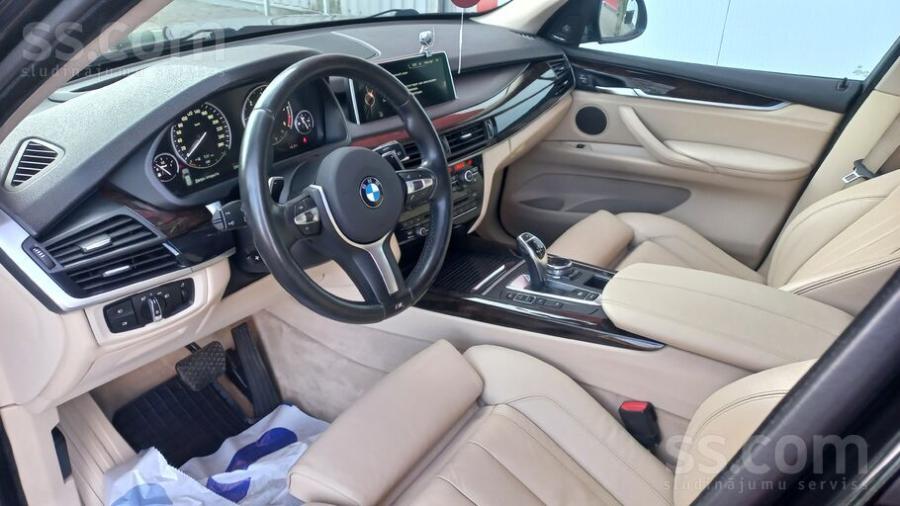 Black BMW X5 2014 in Riga, with an engine capacity of 3.00 L and mileage of 206 thousand km for 16950 €, photo 26 on AUTOMOTO.COM.LV