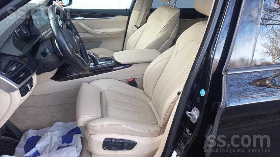 Black BMW X5 2014 in Riga, with an engine capacity of 3.00 L and mileage of 206 thousand km for 16950 €, photo 28 on AUTOMOTO.COM.LV