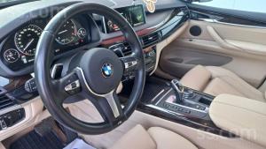 Black BMW X5 2014 in Riga, with an engine capacity of 3.00 L and mileage of 206 thousand km for 16950 €, photo 31 on AUTOMOTO.COM.LV