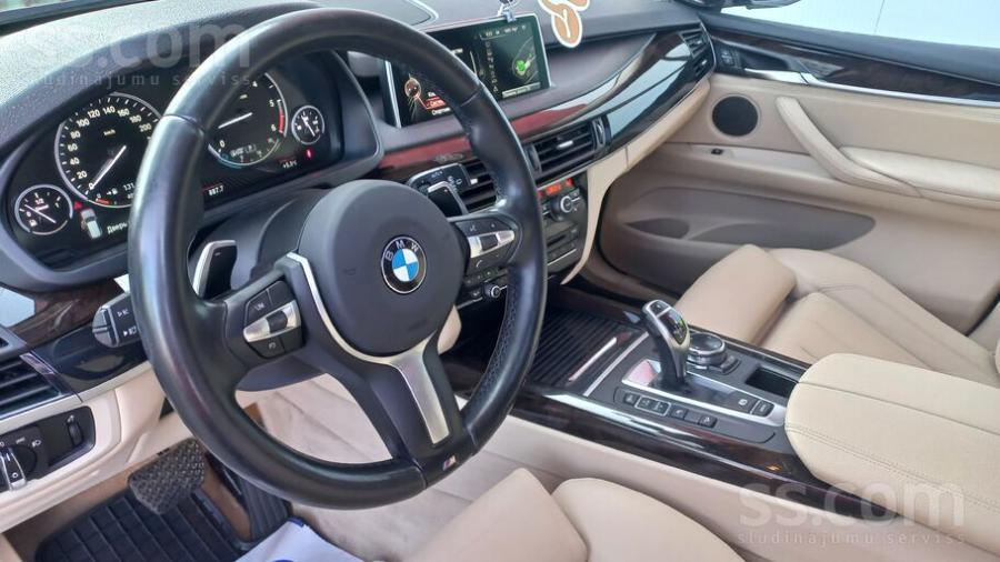 Black BMW X5 2014 in Riga, with an engine capacity of 3.00 L and mileage of 206 thousand km for 16950 €, photo 31 on AUTOMOTO.COM.LV