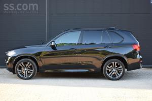 Black BMW X5 2014 in Riga, with an engine capacity of 3.00 L and mileage of 284 thousand km for 19950 €, photo 9 on AUTOMOTO.COM.LV