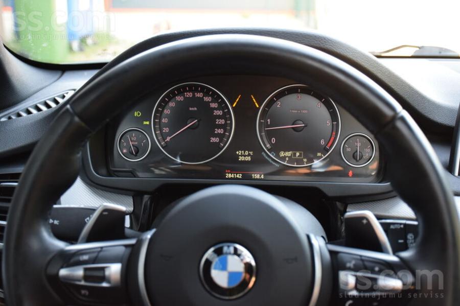 Black BMW X5 2014 in Riga, with an engine capacity of 3.00 L and mileage of 284 thousand km for 19950 €, photo 16 on AUTOMOTO.COM.LV