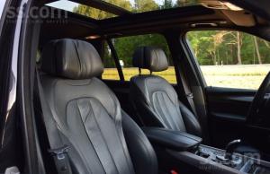 Black BMW X5 2014 in Riga, with an engine capacity of 3.00 L and mileage of 284 thousand km for 19950 €, photo 21 on AUTOMOTO.COM.LV