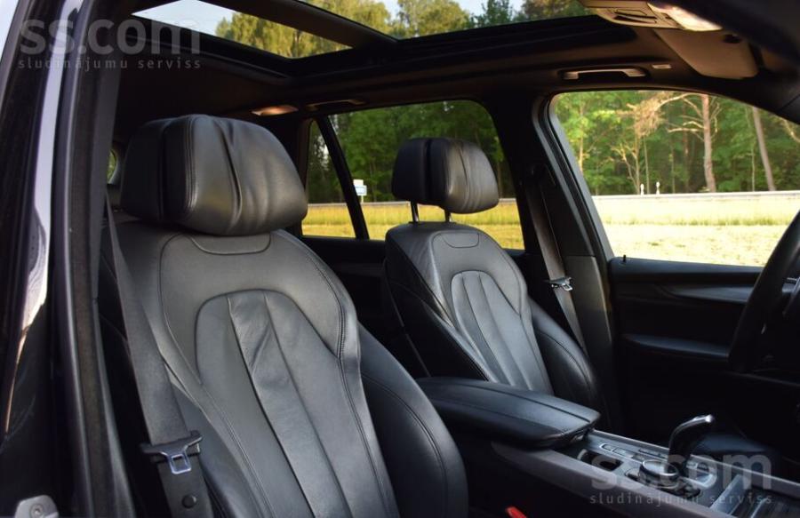 Black BMW X5 2014 in Riga, with an engine capacity of 3.00 L and mileage of 284 thousand km for 19950 €, photo 21 on AUTOMOTO.COM.LV