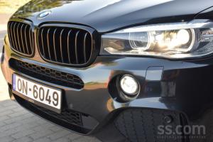 Black BMW X5 2014 in Riga, with an engine capacity of 3.00 L and mileage of 284 thousand km for 19950 €, photo 22 on AUTOMOTO.COM.LV