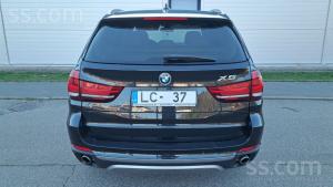 Black BMW X5 2014 in Riga, with an engine capacity of 2.00 L and mileage of 209 thousand km for 20950 €, photo 8 on AUTOMOTO.COM.LV