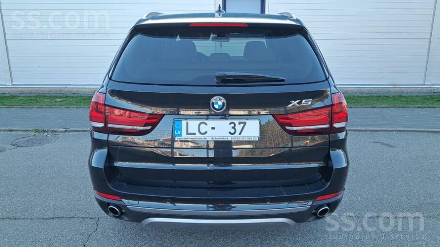 Black BMW X5 2014 in Riga, with an engine capacity of 2.00 L and mileage of 209 thousand km for 20950 €, photo 8 on AUTOMOTO.COM.LV