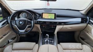 Black BMW X5 2014 in Riga, with an engine capacity of 2.00 L and mileage of 209 thousand km for 20950 €, photo 12 on AUTOMOTO.COM.LV