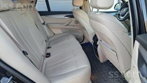 Black BMW X5 2014 in Riga, with an engine capacity of 2.00 L and mileage of 209 thousand km for 20950 €, photo 13 on AUTOMOTO.COM.LV