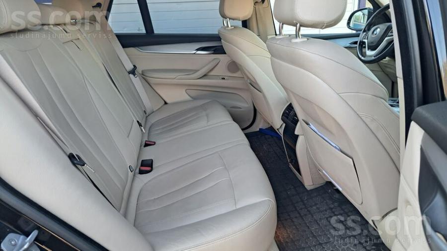 Black BMW X5 2014 in Riga, with an engine capacity of 2.00 L and mileage of 209 thousand km for 20950 €, photo 13 on AUTOMOTO.COM.LV