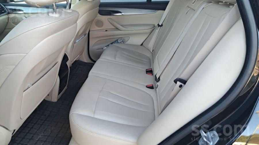 Black BMW X5 2014 in Riga, with an engine capacity of 2.00 L and mileage of 209 thousand km for 20950 €, photo 16 on AUTOMOTO.COM.LV