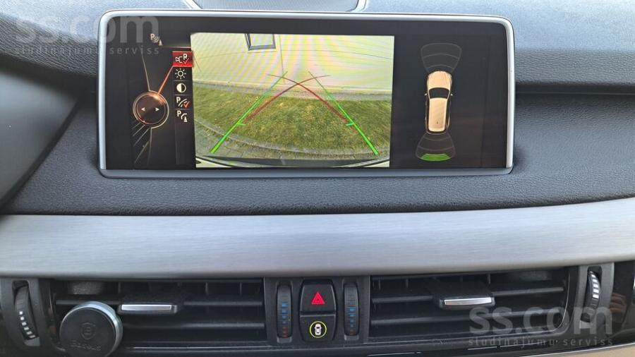 Black BMW X5 2014 in Riga, with an engine capacity of 2.00 L and mileage of 209 thousand km for 20950 €, photo 18 on AUTOMOTO.COM.LV