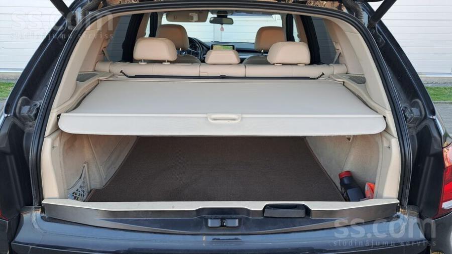Black BMW X5 2014 in Riga, with an engine capacity of 2.00 L and mileage of 209 thousand km for 20950 €, photo 20 on AUTOMOTO.COM.LV