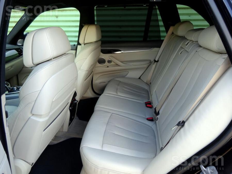 Black BMW X5 2014 in Riga, with an engine capacity of 3.00 L and mileage of 266 thousand km for 19900 €, photo 8 on AUTOMOTO.COM.LV