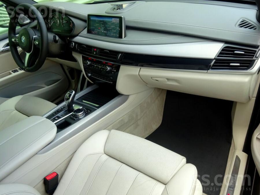 Black BMW X5 2014 in Riga, with an engine capacity of 3.00 L and mileage of 266 thousand km for 19900 €, photo 9 on AUTOMOTO.COM.LV