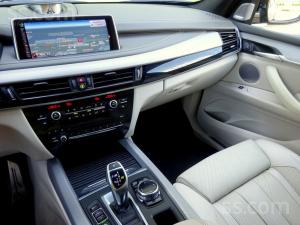 Black BMW X5 2014 in Riga, with an engine capacity of 3.00 L and mileage of 266 thousand km for 19900 €, photo 11 on AUTOMOTO.COM.LV