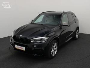 Black BMW X5 2014 in Vilnius, with an engine capacity of 3.00 L and mileage of 205 thousand km for 22999 €, photo  on AUTOMOTO.COM.LV