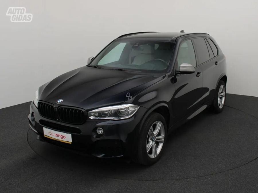 Black BMW X5 2014 in Vilnius, with an engine capacity of 3.00 L and mileage of 205 thousand km for 22999 €, photo 1 on AUTOMOTO.COM.LV
