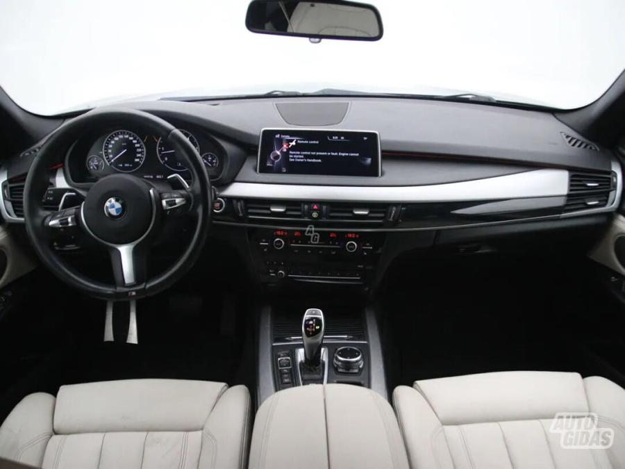 Black BMW X5 2014 in Vilnius, with an engine capacity of 3.00 L and mileage of 205 thousand km for 22999 €, photo 3 on AUTOMOTO.COM.LV
