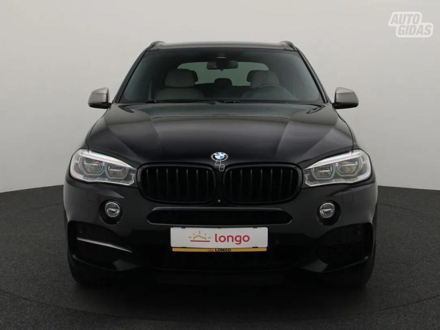 Black BMW X5 2014 in Vilnius, with an engine capacity of 3.00 L and mileage of 205 thousand km for 22999 €, photo 4 on AUTOMOTO.COM.LV