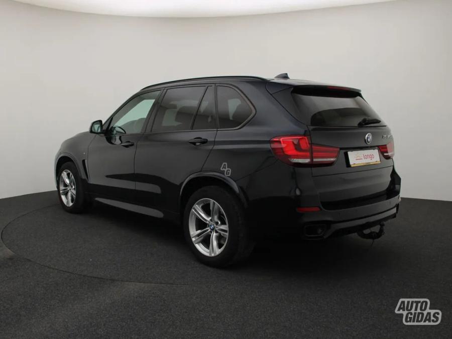 Black BMW X5 2014 in Vilnius, with an engine capacity of 3.00 L and mileage of 205 thousand km for 22999 €, photo 8 on AUTOMOTO.COM.LV