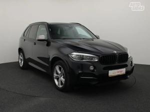 Black BMW X5 2014 in Vilnius, with an engine capacity of 3.00 L and mileage of 205 thousand km for 22999 €, photo 11 on AUTOMOTO.COM.LV