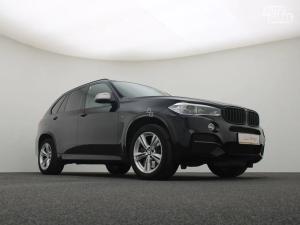 Black BMW X5 2014 in Vilnius, with an engine capacity of 3.00 L and mileage of 205 thousand km for 22999 €, photo 12 on AUTOMOTO.COM.LV