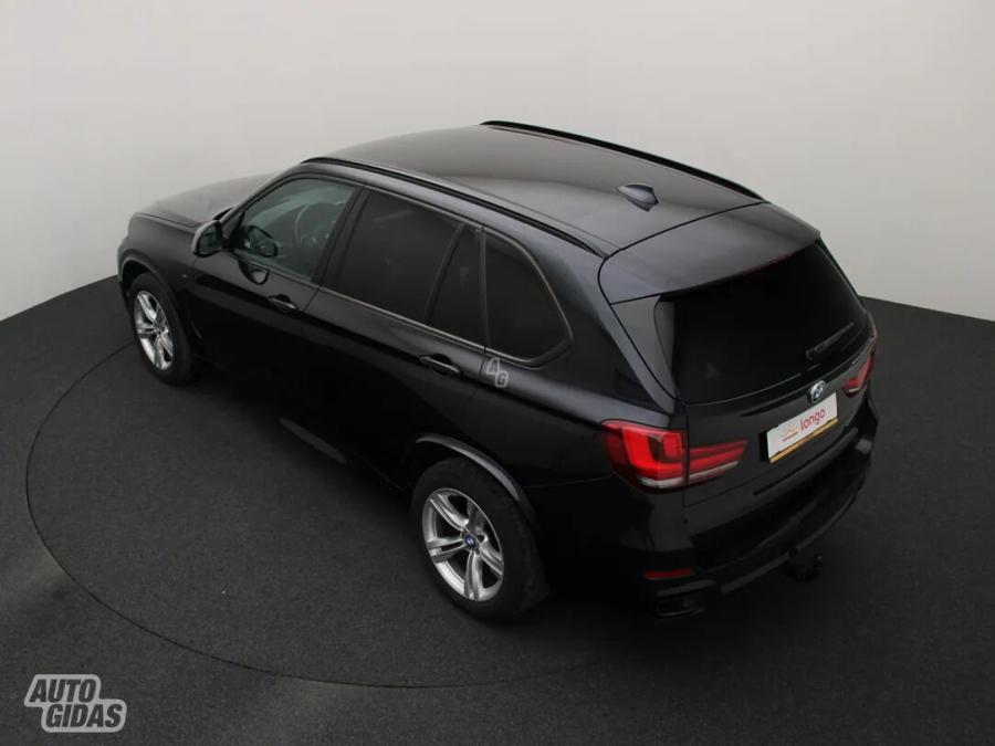 Black BMW X5 2014 in Vilnius, with an engine capacity of 3.00 L and mileage of 205 thousand km for 22999 €, photo 13 on AUTOMOTO.COM.LV