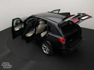 Black BMW X5 2014 in Vilnius, with an engine capacity of 3.00 L and mileage of 205 thousand km for 22999 €, photo 14 on AUTOMOTO.COM.LV