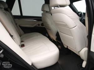 Black BMW X5 2014 in Vilnius, with an engine capacity of 3.00 L and mileage of 205 thousand km for 22999 €, photo 16 on AUTOMOTO.COM.LV
