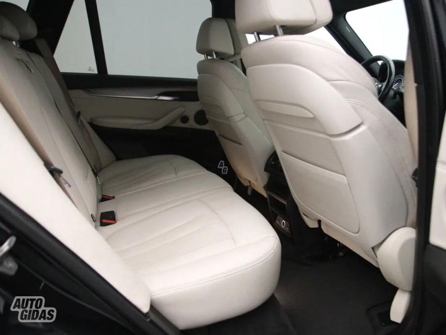 Black BMW X5 2014 in Vilnius, with an engine capacity of 3.00 L and mileage of 205 thousand km for 22999 €, photo 16 on AUTOMOTO.COM.LV