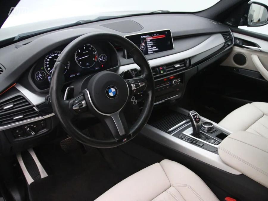 Black BMW X5 2014 in Vilnius, with an engine capacity of 3.00 L and mileage of 205 thousand km for 22999 €, photo 17 on AUTOMOTO.COM.LV